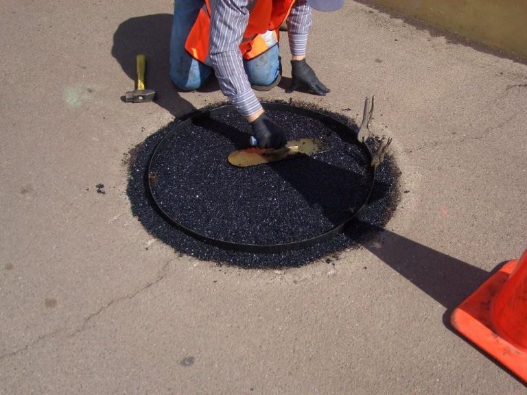 Polylast Roadway Repair - Manhole Lid Leveling and Collar Repair